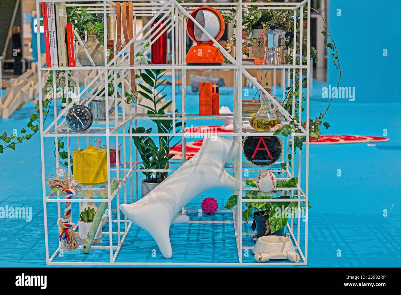 white abstract figurine of a dog or cat in a toy house for pets Stock ...