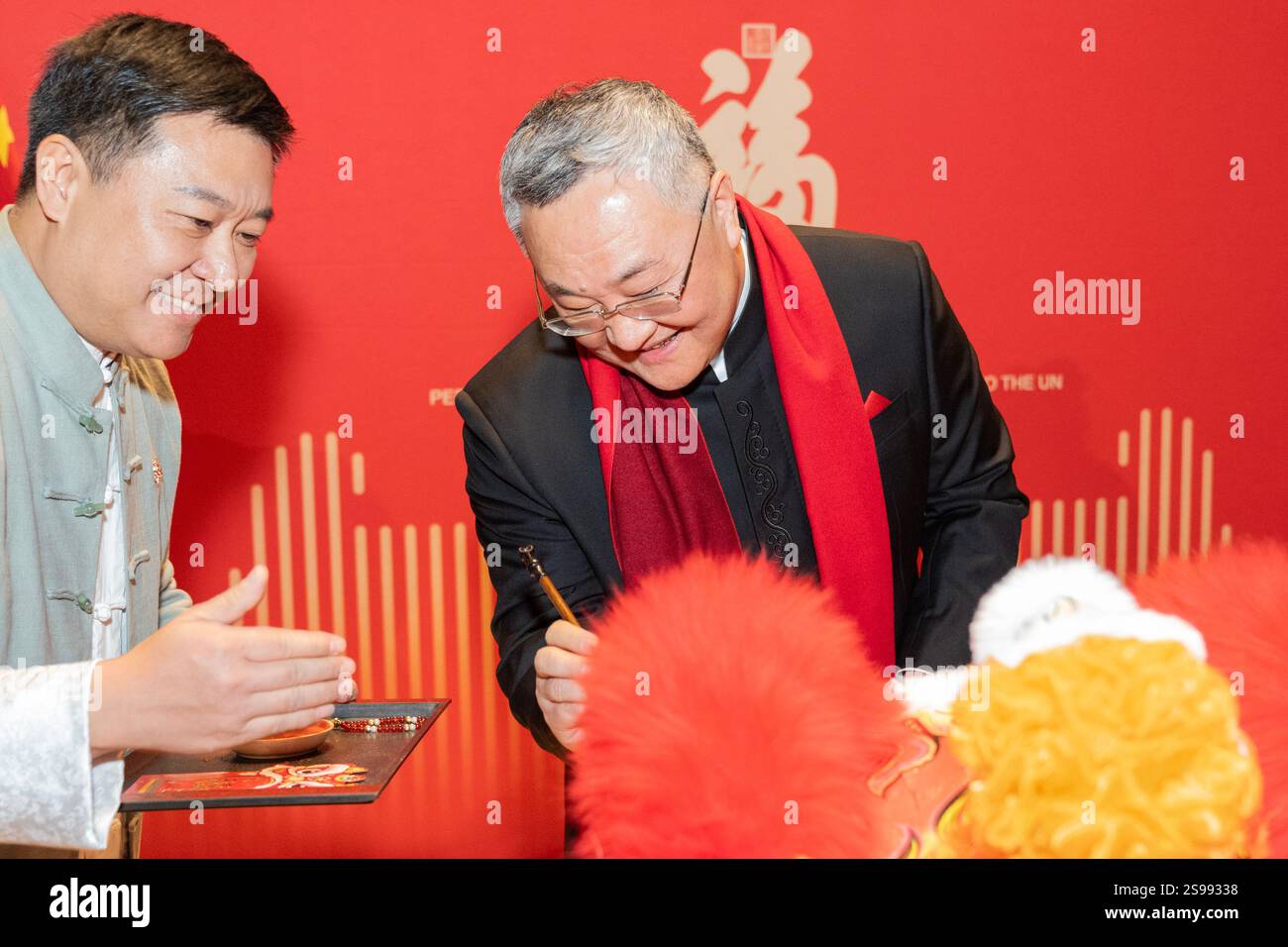 Ambassador Fu Cong of China signs traditional lion character during ...