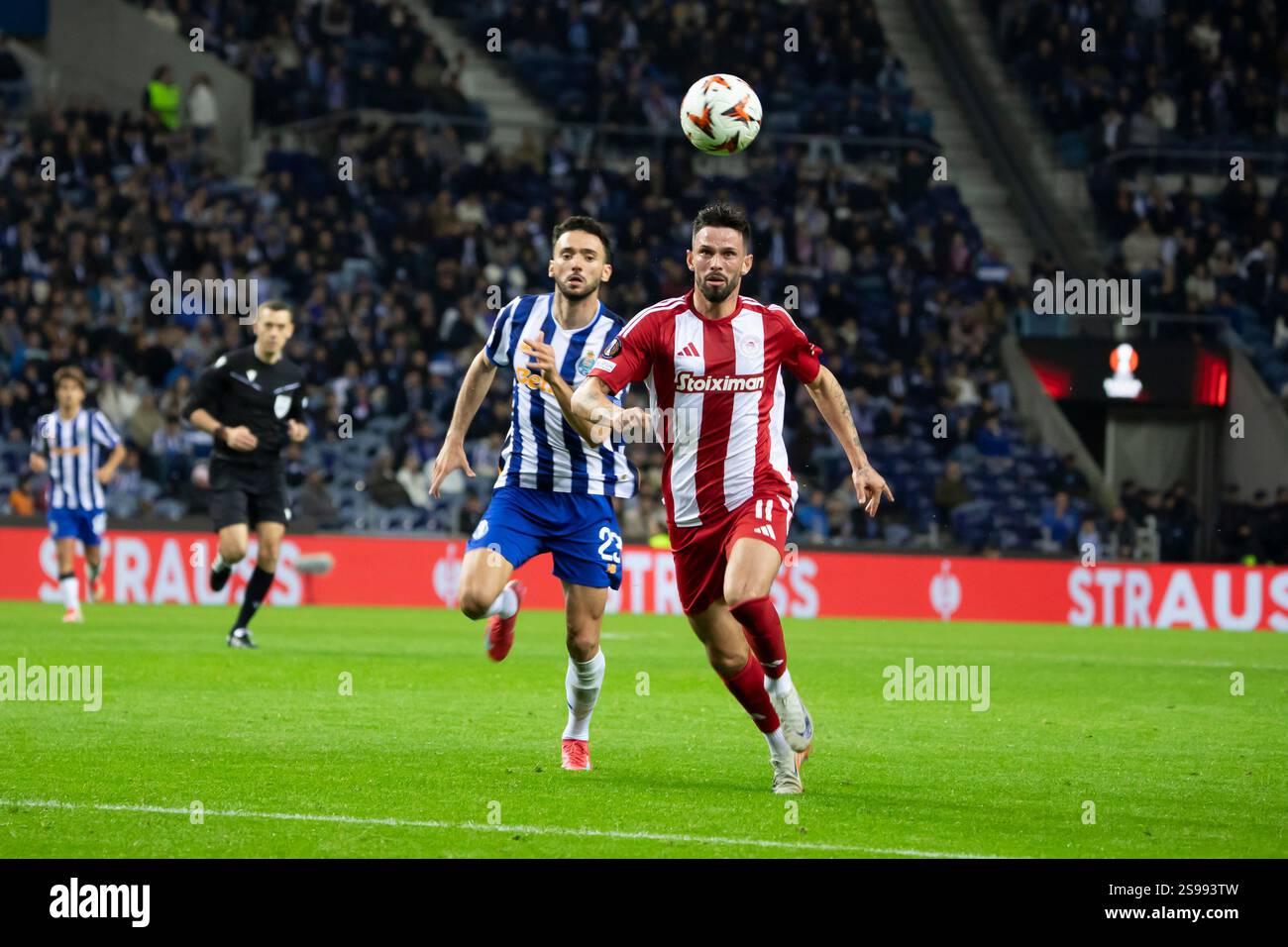 Kristoffer Velde (R) for Olympiacos and Joao Mario (L) for FC Porto ...
