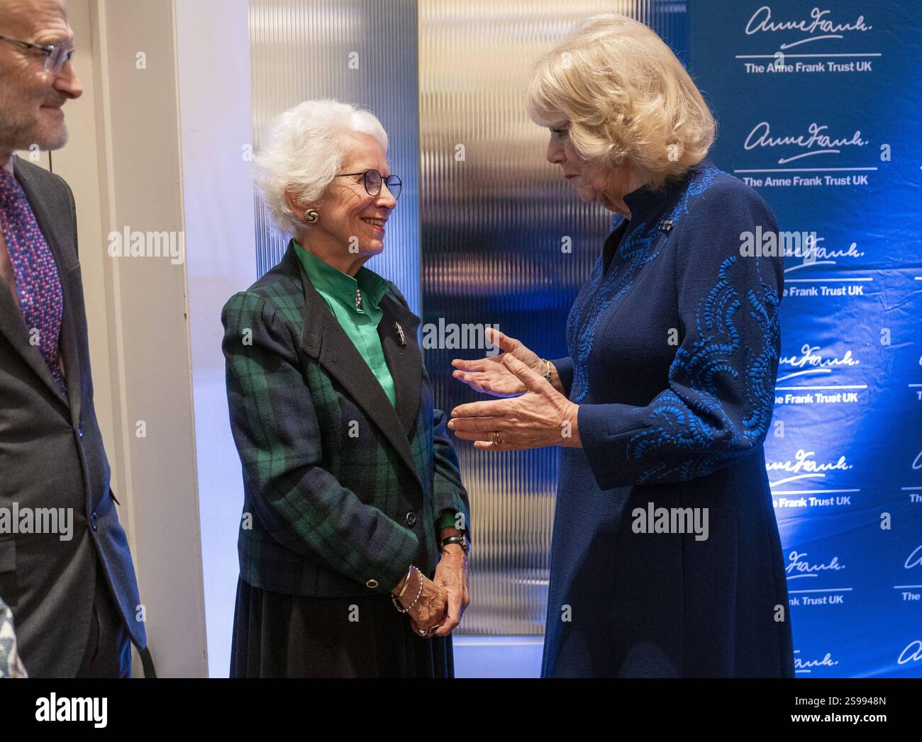 File photo dated 23/01/25 of Queen Camilla (right) speaking to ...