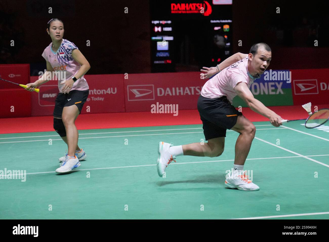 Rinov Rivaldy, right, and Lisa Ayu Kusumawati of Indonesia play against ...