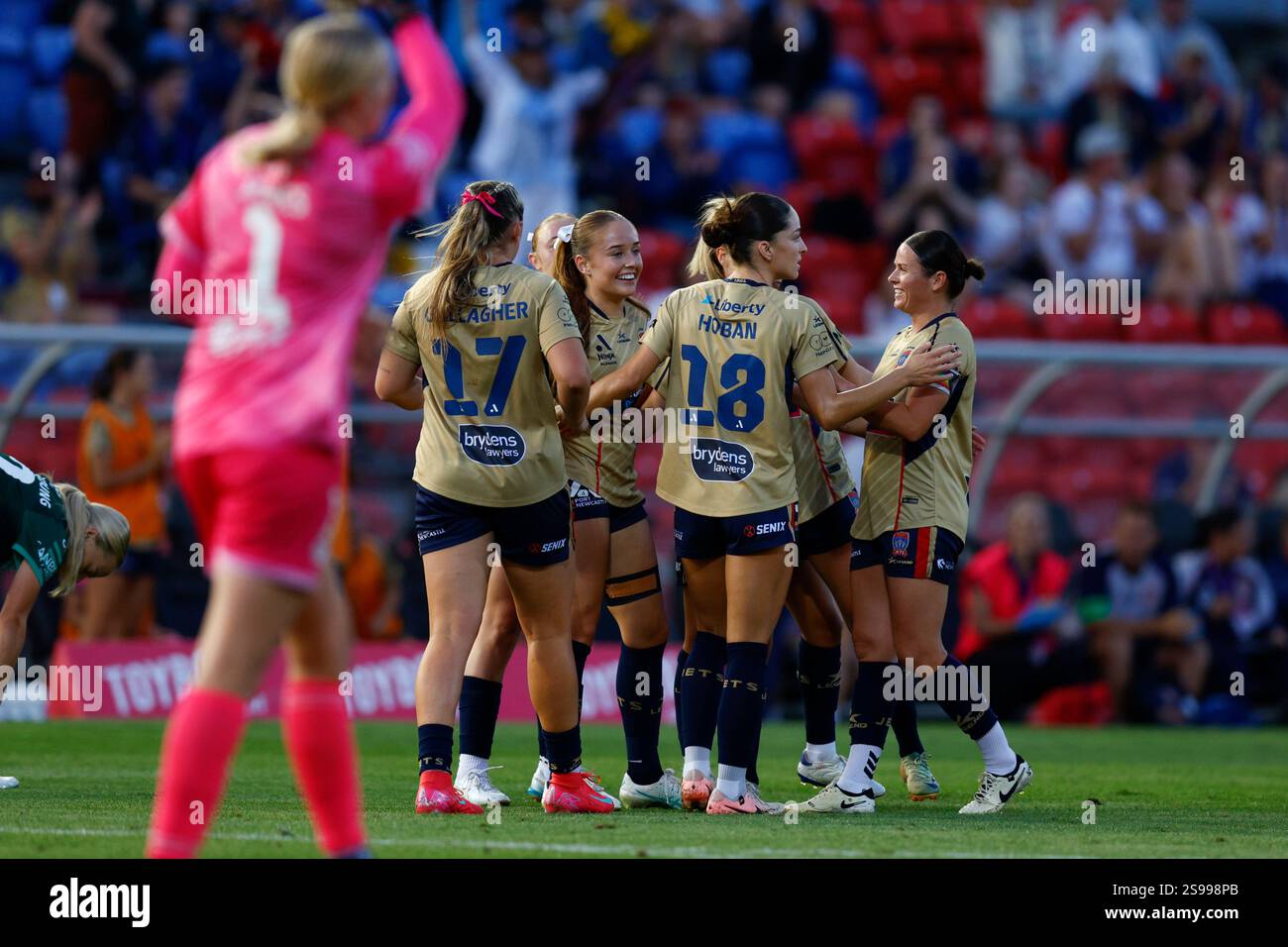 Lara Gooch of the Jets (third from left) celebrates with teammates ...