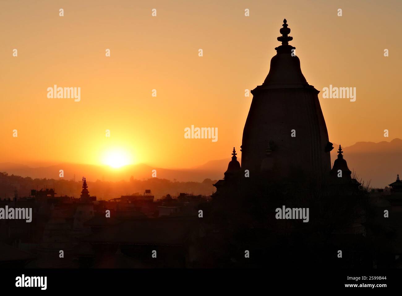 The skyline of the old town of Bhaktapur and the silhouette, contour of ...