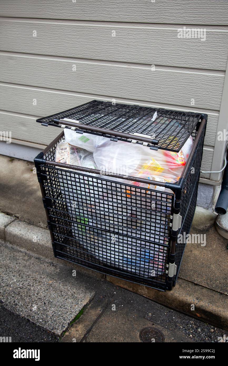 Recycling trash bin in a small street in Akabane, Tokyo, Japan Stock ...