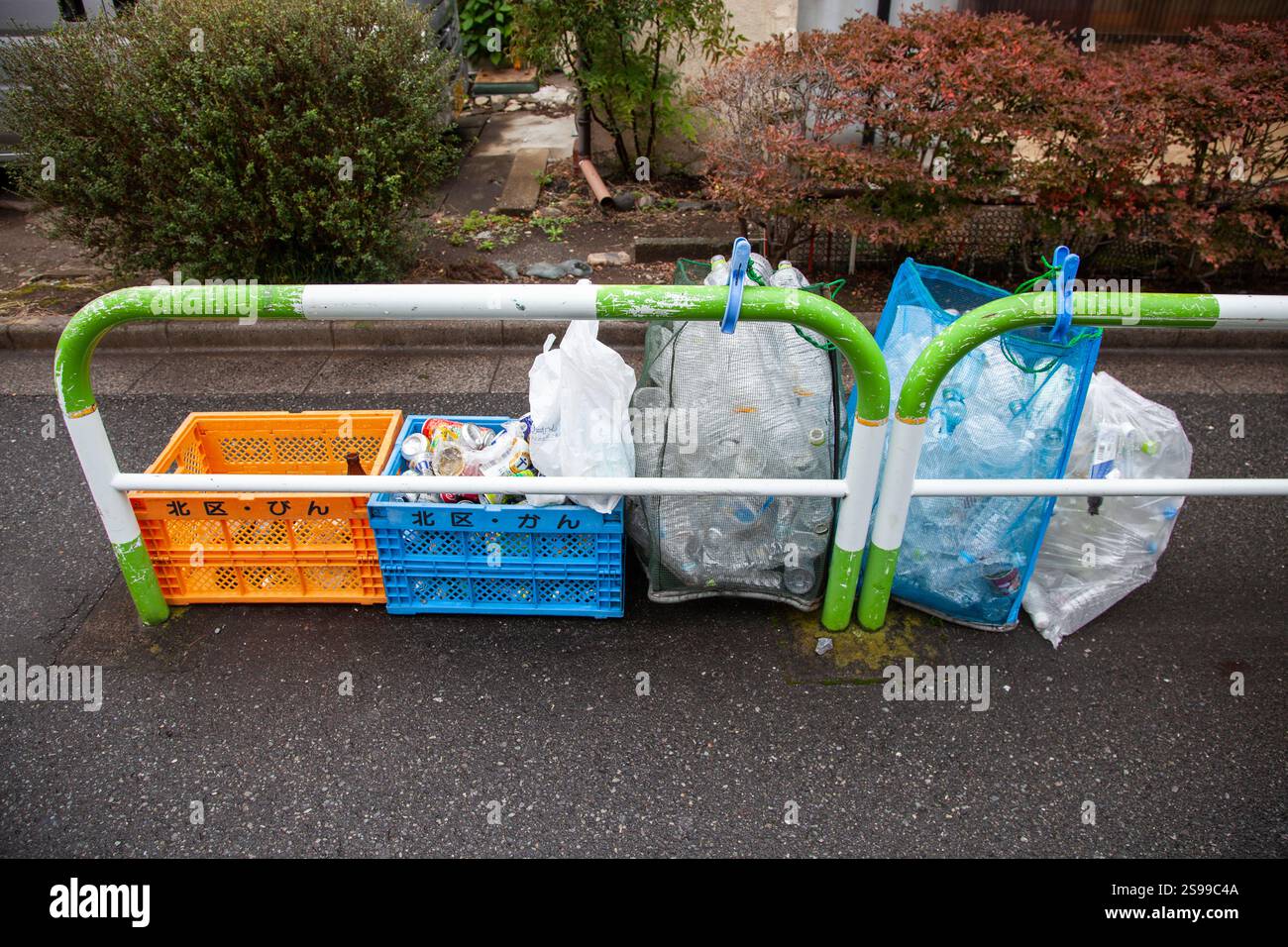 Recycling trash bins in a small street in Akabane, Tokyo, Japan Stock ...