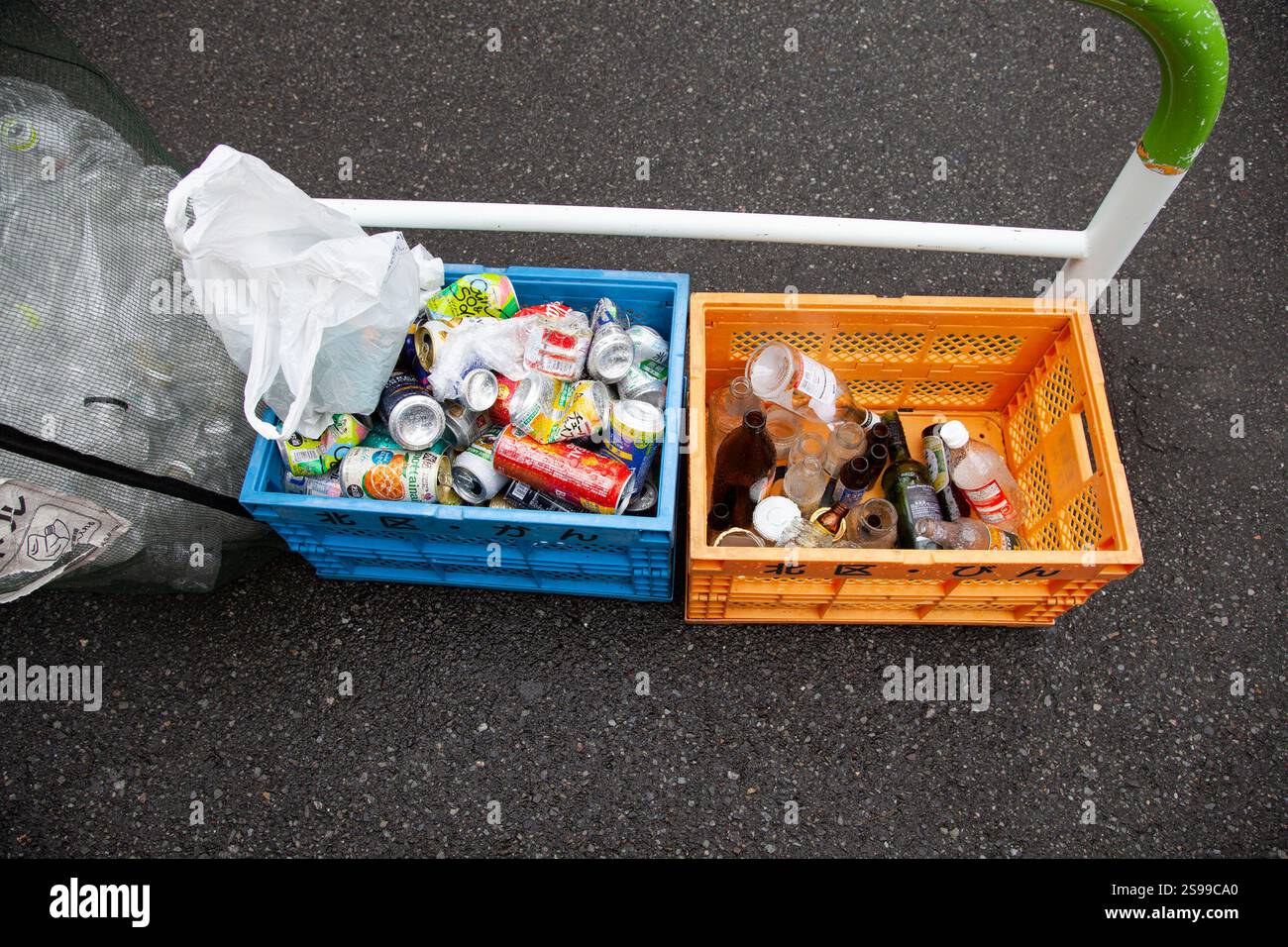 Recycling trash bins in a small street in Akabane, Tokyo, Japan Stock ...