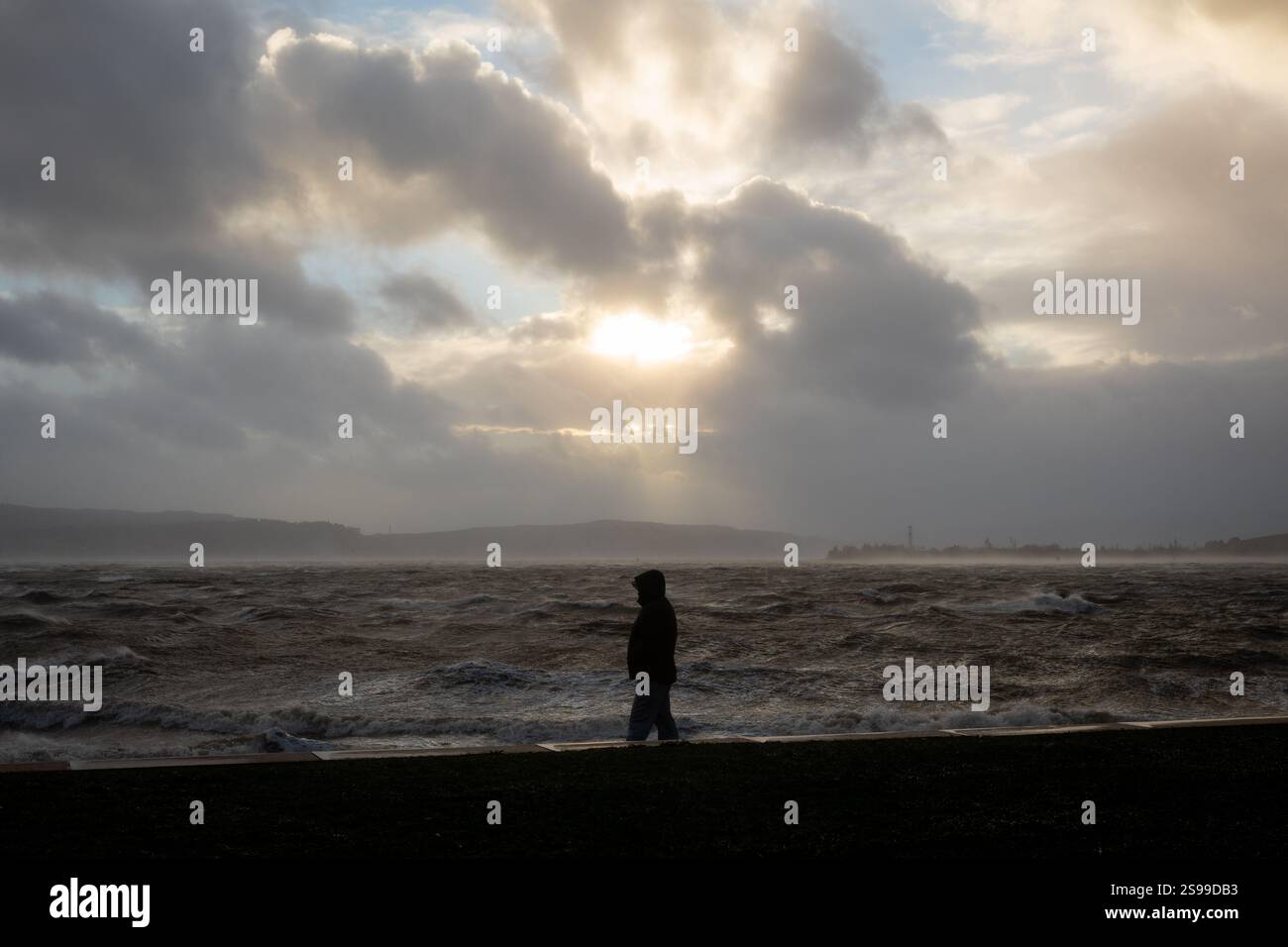 Helensburgh, Scotland, 24th Jan 2025. Local man taking a stroll along ...