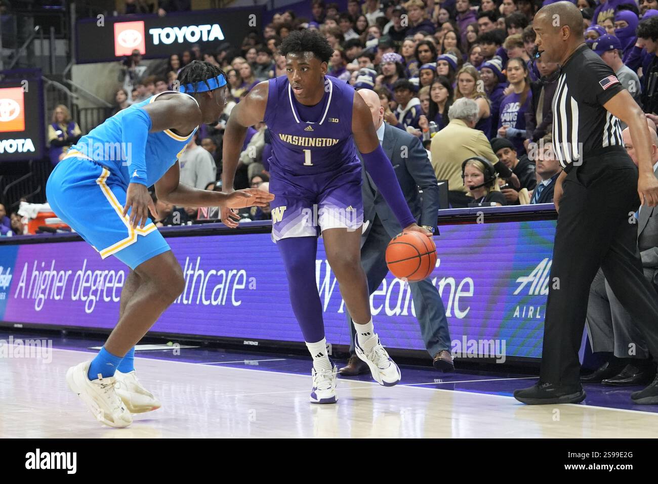 Washington Huskies forward Great Osobor (1) handles the ball with UCLA ...