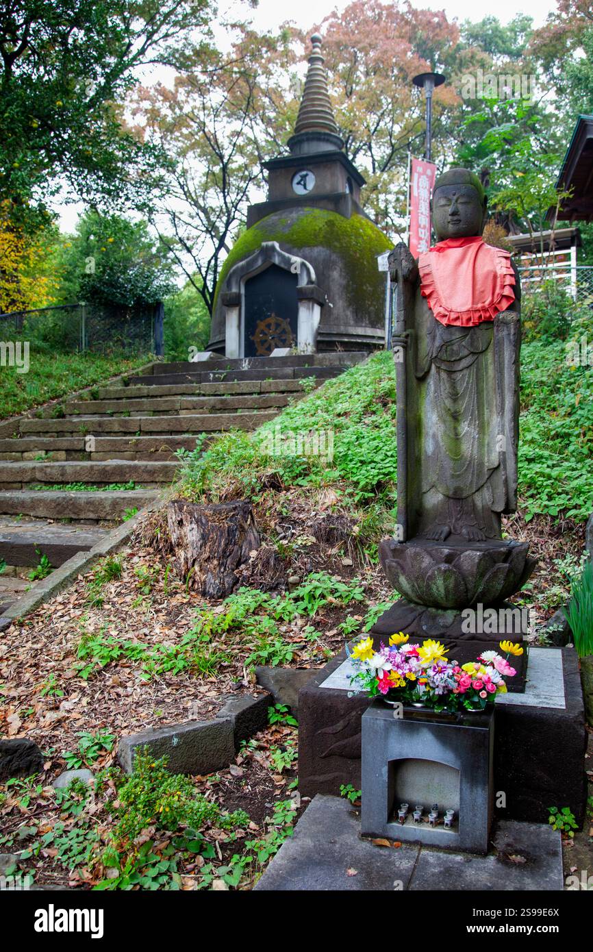 Ueno Daibutsu pagoda at Great Buddha Hill with a Jizo buddha statue in ...