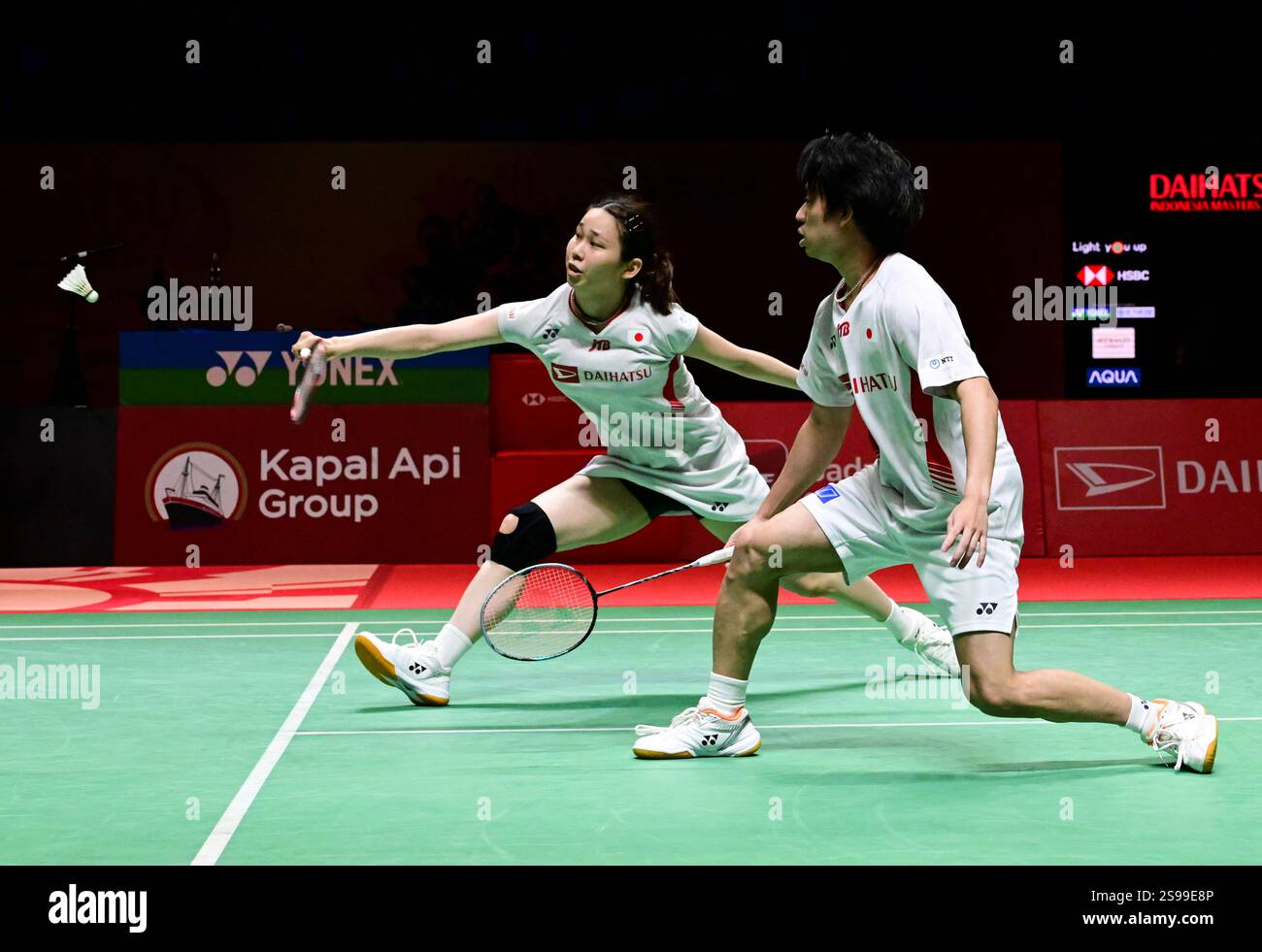 (250125) -- JAKARTA, Jan. 25, 2025 (Xinhua) -- Midorikawa Hiroki (R)/Saito Natsu compete during ...