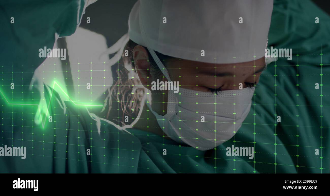 Surgeon preparing for surgery with green heartbeat image over medical ...
