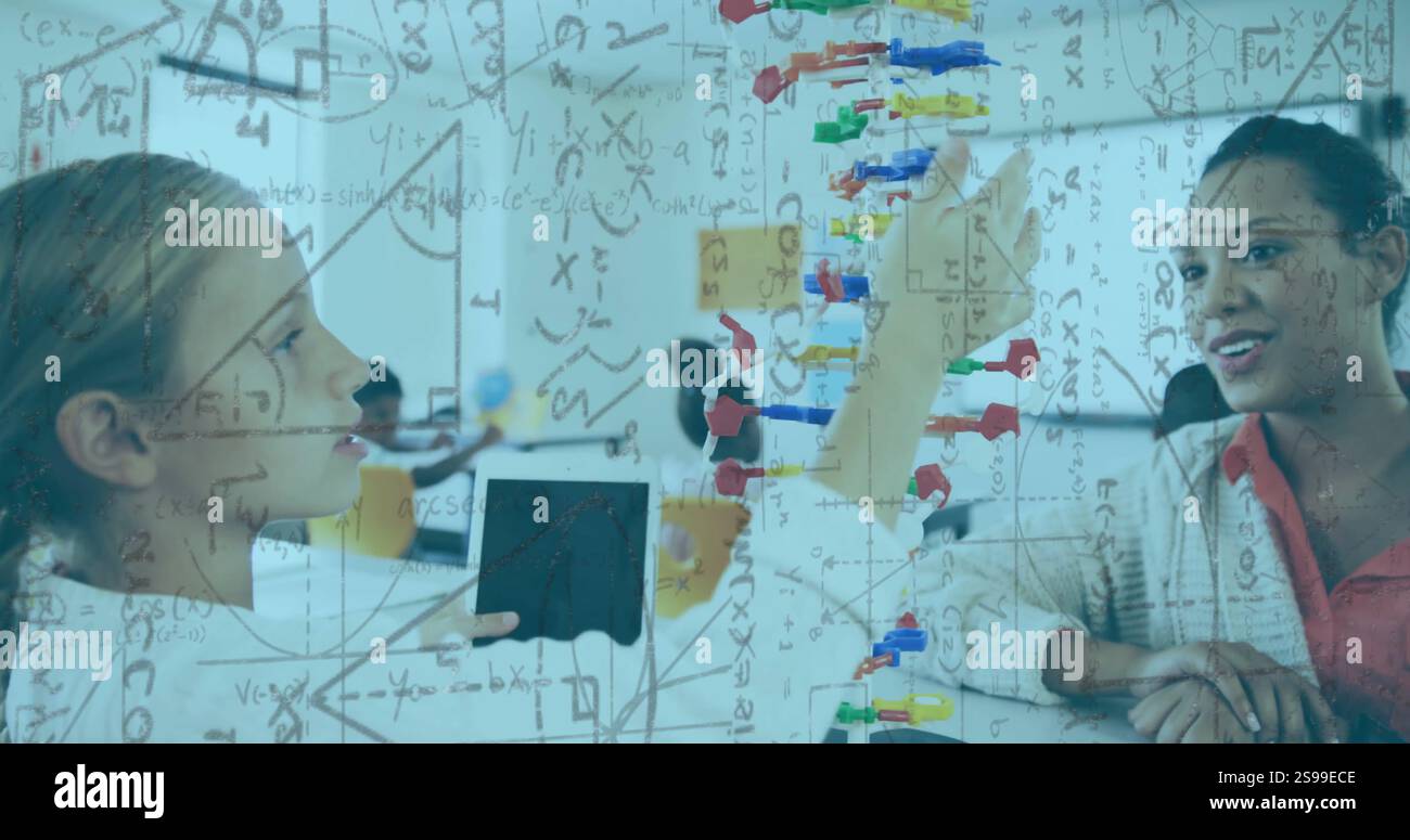 DNA model and scientific equations image over students studying in classroom Stock Photo - Alamy