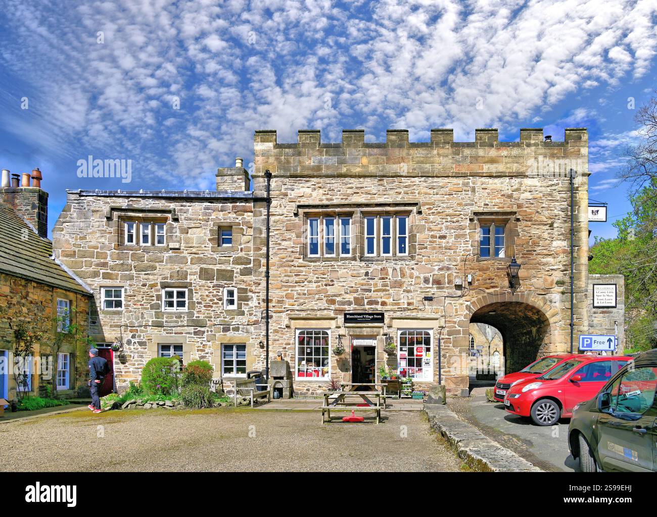 Blanchland ancient village store and Post Office with backdrop of blue ...