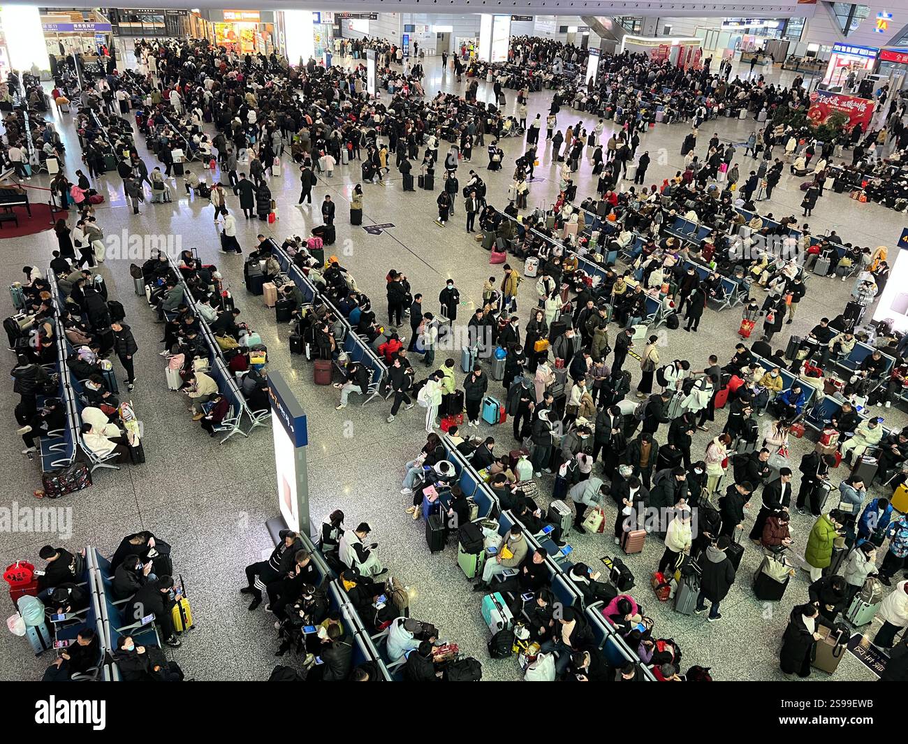 NINGBO, CHINA - JANUARY 25, 2025 - A large number of passengers wait at ...