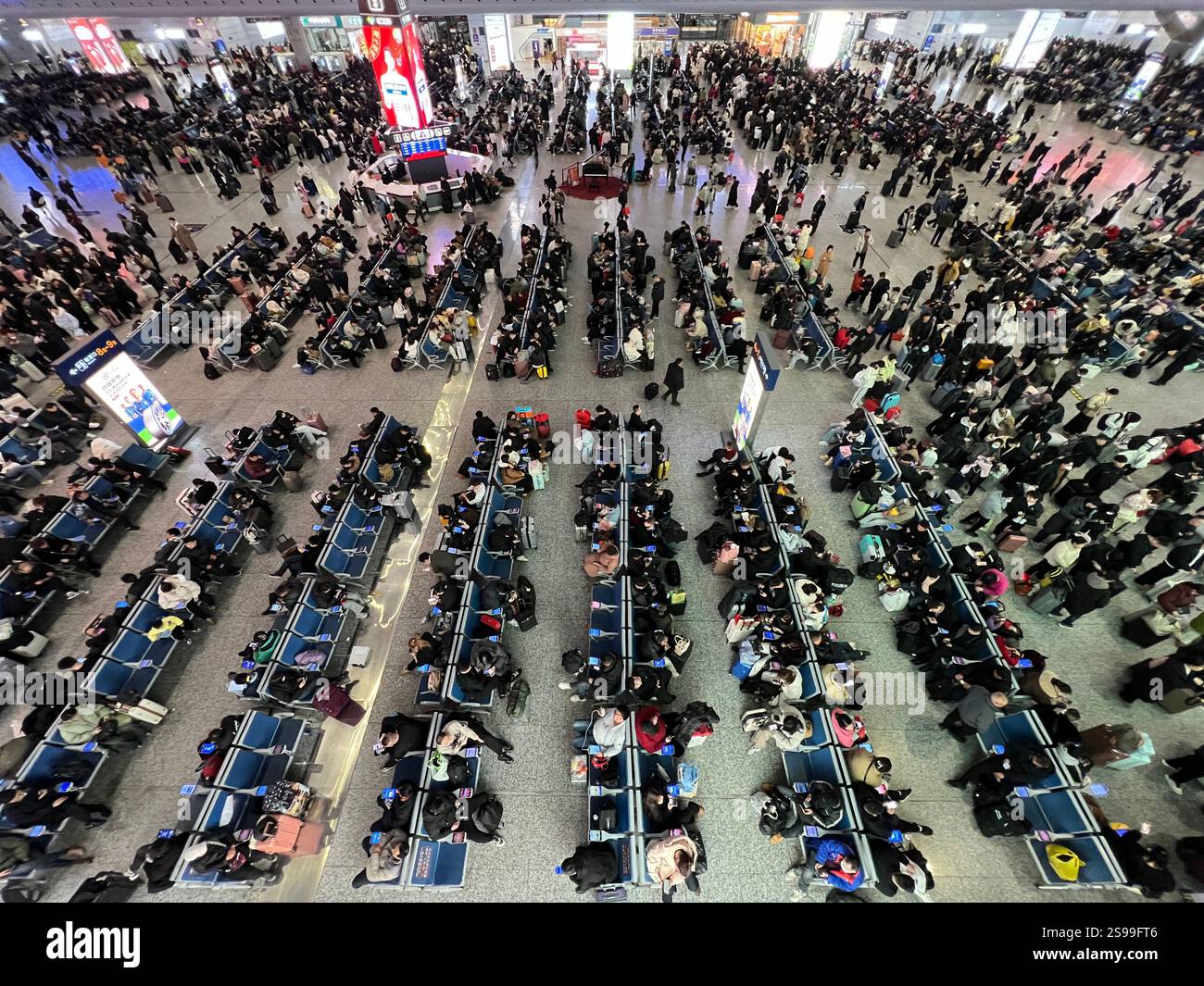 NINGBO, CHINA - JANUARY 25, 2025 - A large number of passengers wait at ...