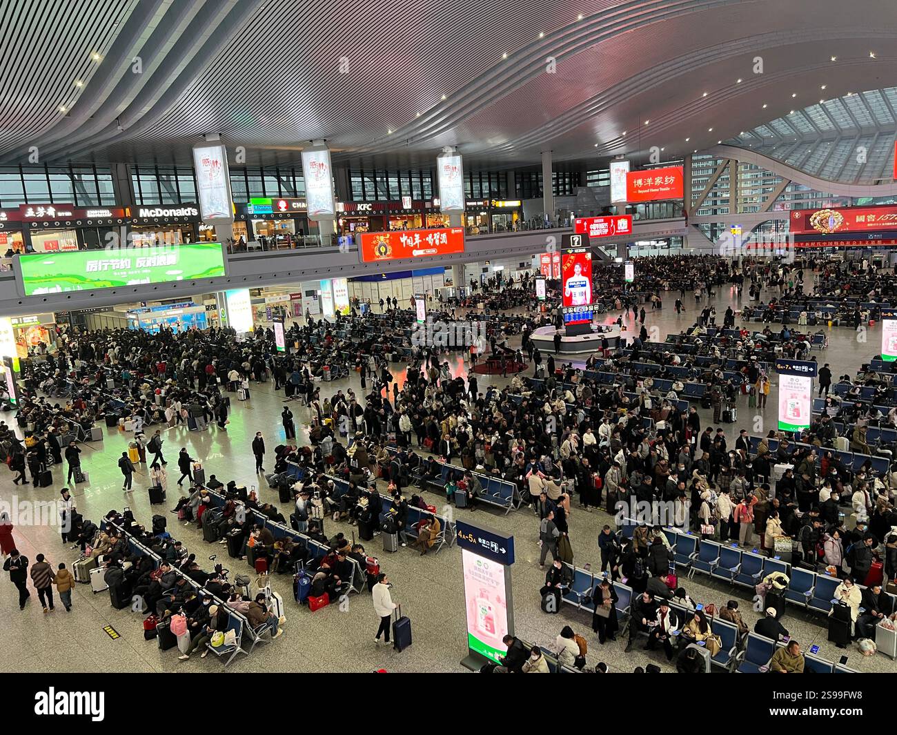 NINGBO, CHINA - JANUARY 25, 2025 - A large number of passengers wait at ...