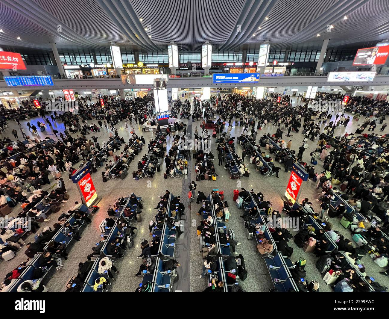 NINGBO, CHINA - JANUARY 25, 2025 - A large number of passengers wait at ...