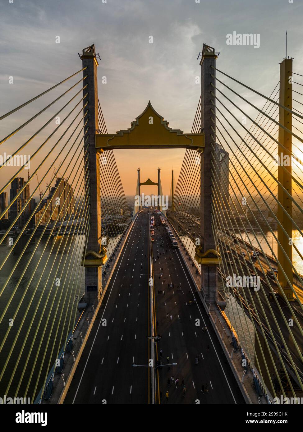 Thotsamarachan Bridge (Rama IX Bridge) crossing Chao phraya river. Beautiful city of Bangkok ...