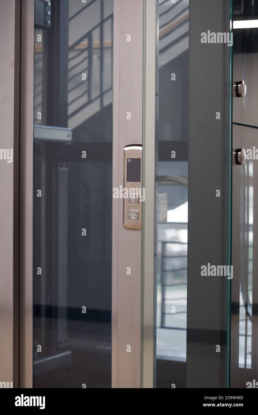 Close-up of Modern Elevator Control Panel and Glass Door Stock Photo ...