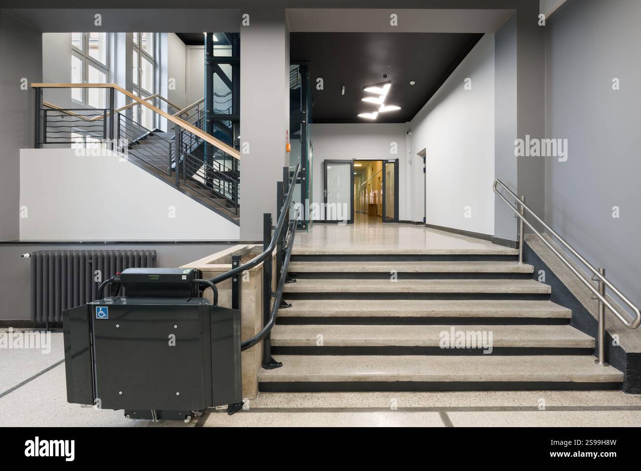 Interior View of a Building with Staircase, Elevator and Wheelchair ...