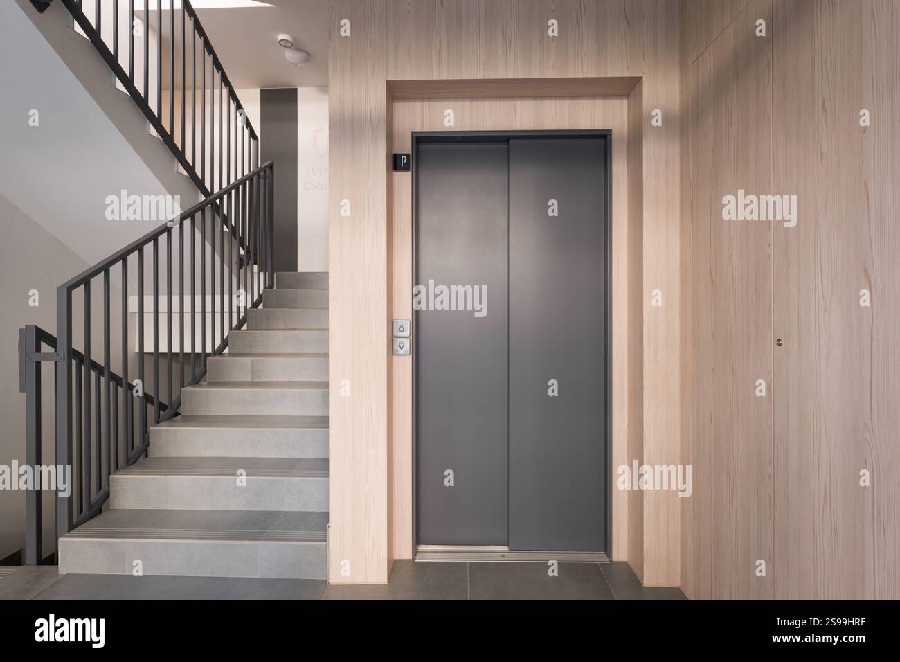 Modern Building Interior with Elevator and Stairs Stock Photo - Alamy