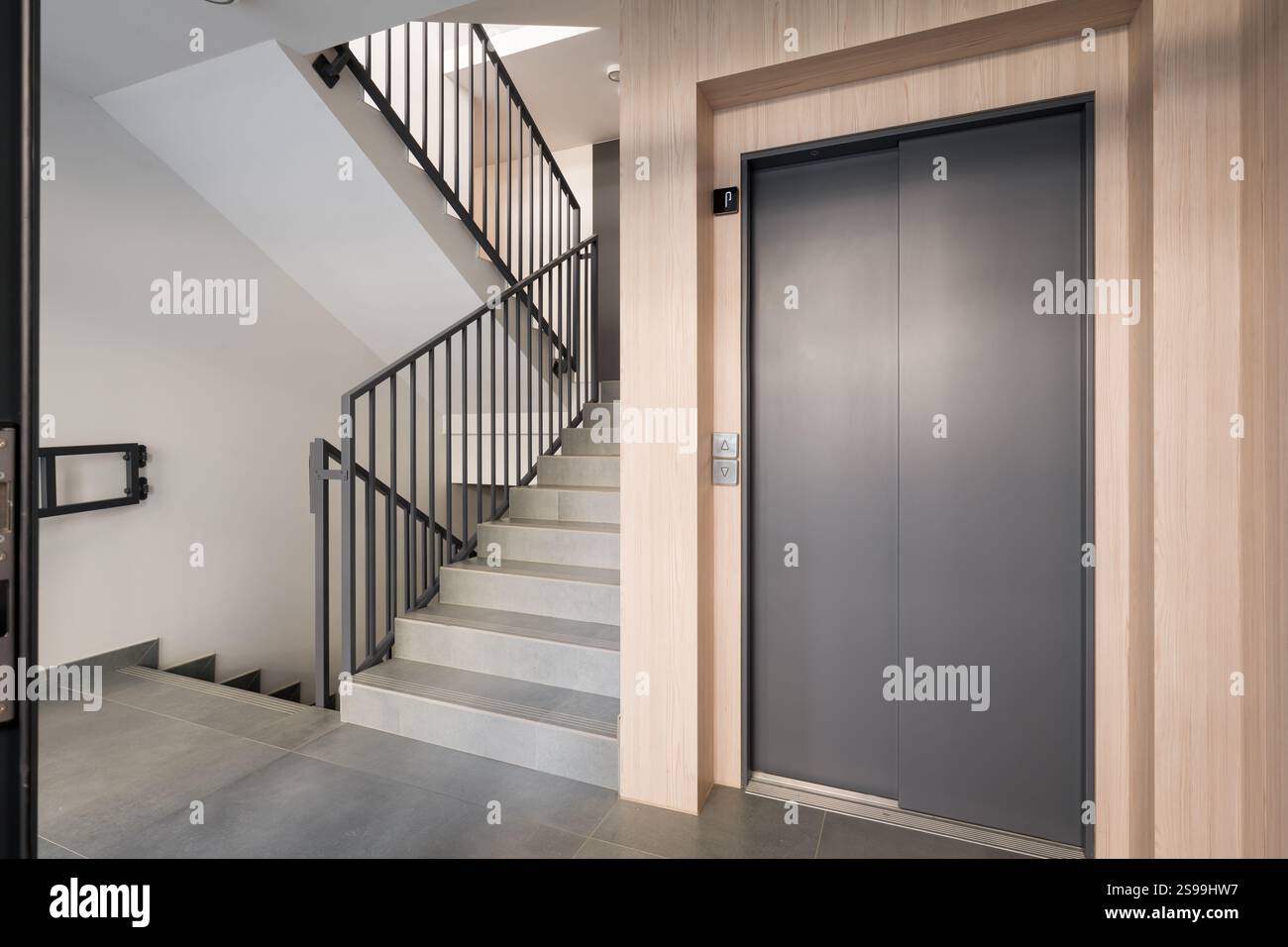 Modern Interior with Elevator and Staircase Stock Photo - Alamy