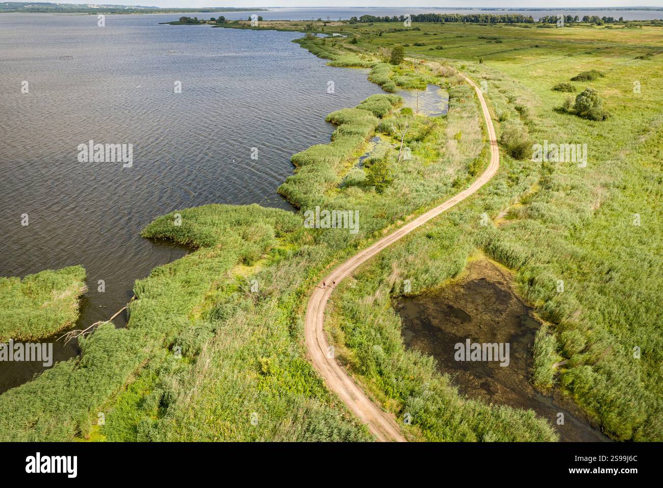 Aerial View of a Lake, Wetlands, and a Rural Path Stock Photo - Alamy