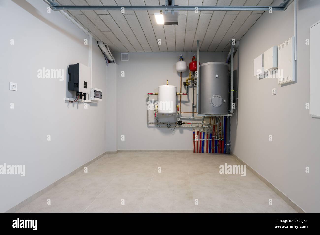 Utility Room, garage with Water Heaters and Electrical Components Stock ...