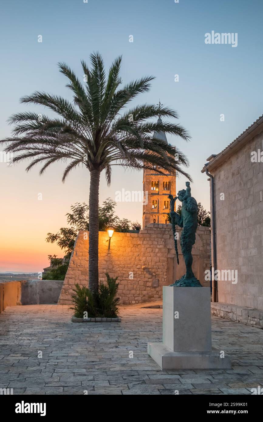 Statue of Saint Christopher in front of the Cathedral in Rab town ...