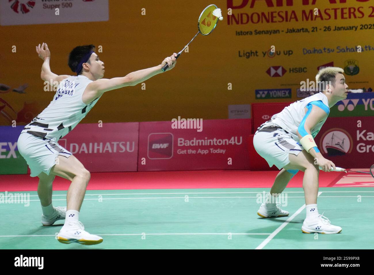 Aaron Chia, right, and Soh Wooi Yik of Malaysia play against Man Wei Chong and Kai Wun Tee of ...