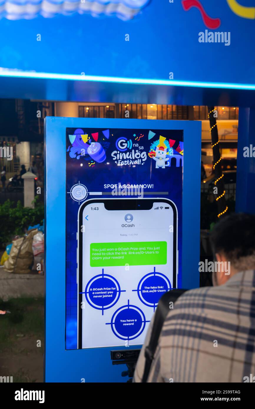 Gcash spot a scam screen game stand Cebu, Philippines Stock Photo - Alamy