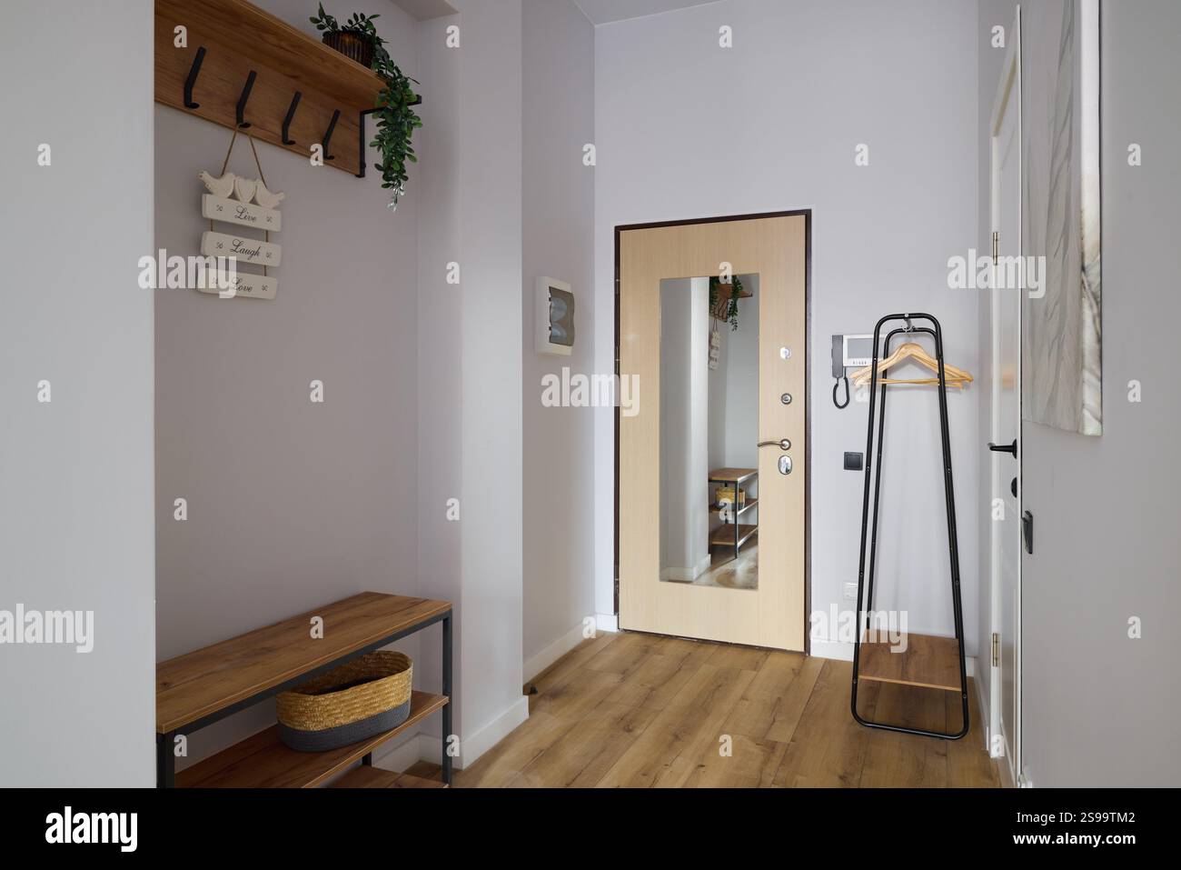 An Elegantly Modern and Stylish Home Entrance Featuring Beautiful ...