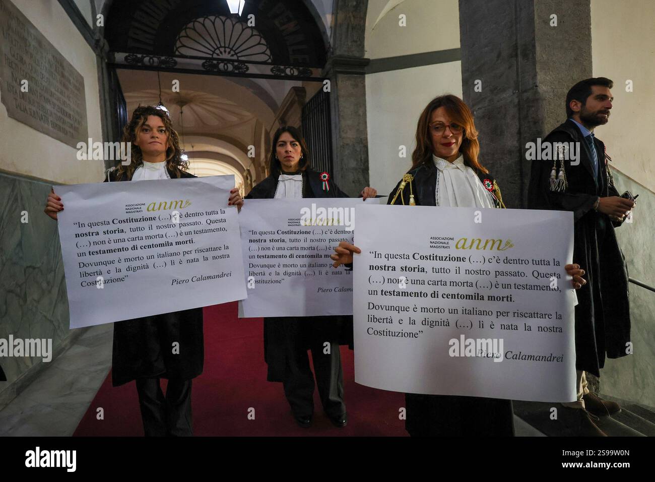 Naples, Italy, 25 January 2025. Magistrates and lawyers display ...