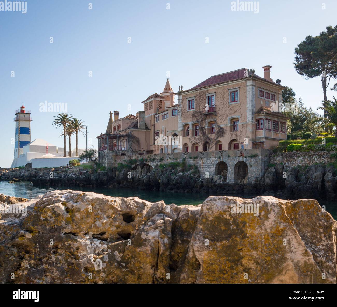 Santa Marta Lighthouse and Coastal Buildings in Cascais, Portugal Stock ...