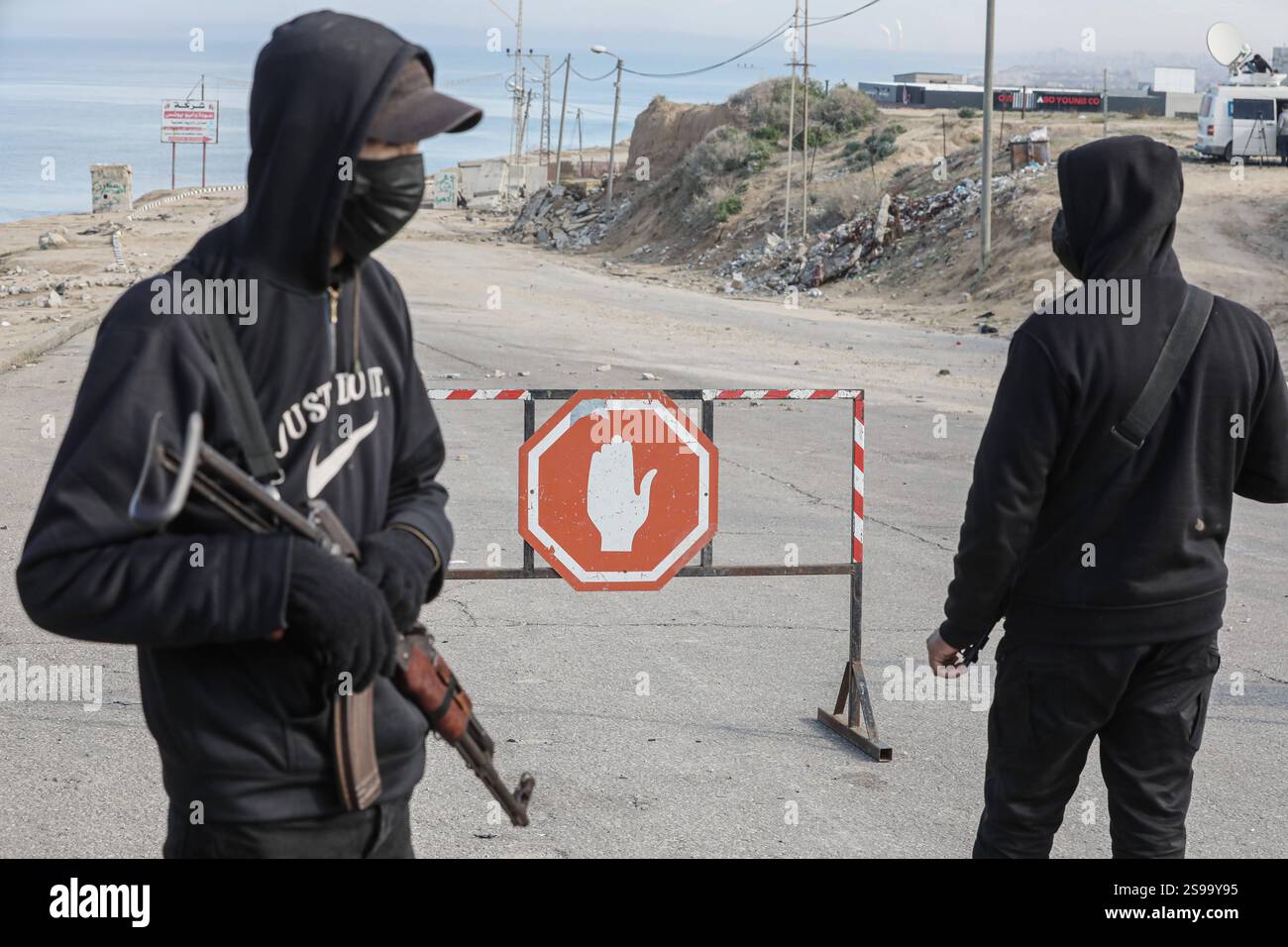 Palestinian police take measures at the check point on Al-Rashid Street ...