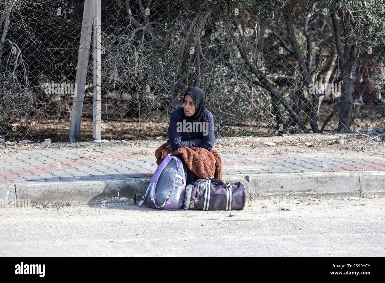 Palestinian police take measures at the check point on Al-Rashid Street ...