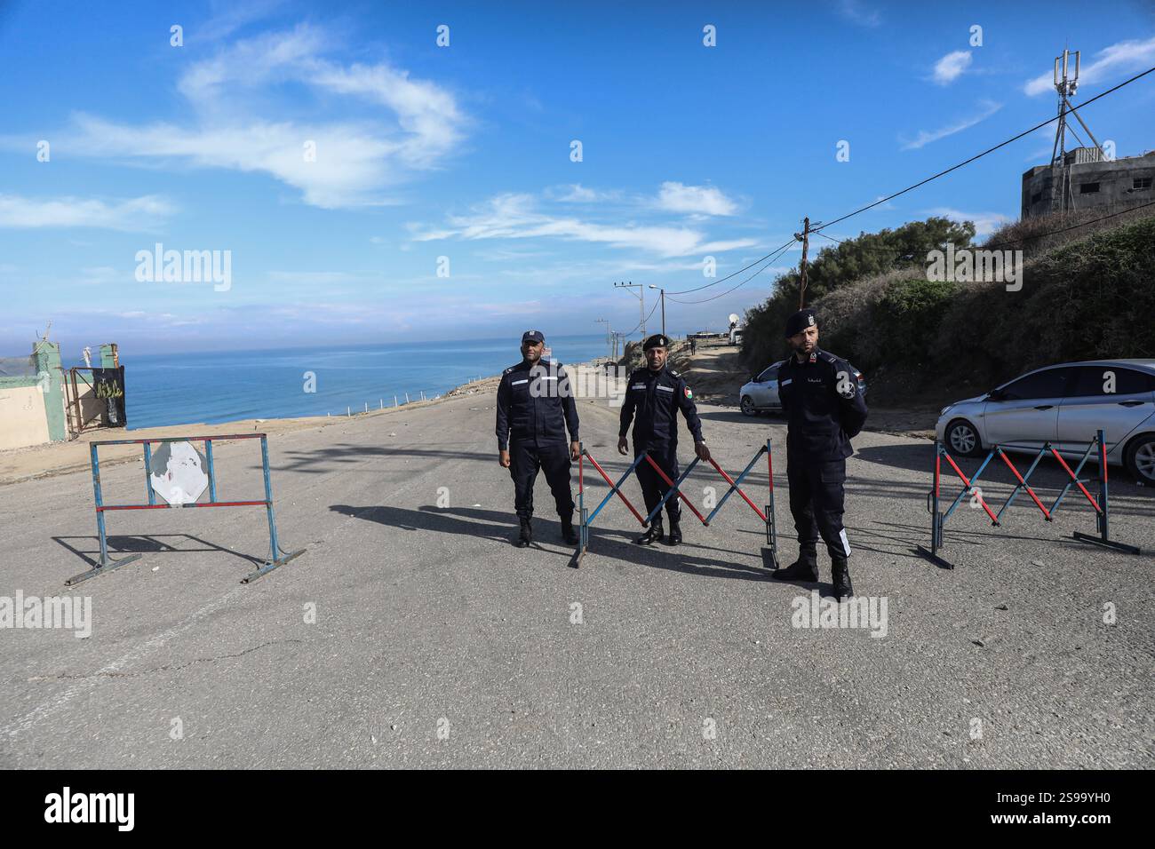 Palestinian police take measures at the check point on Al-Rashid Street ...