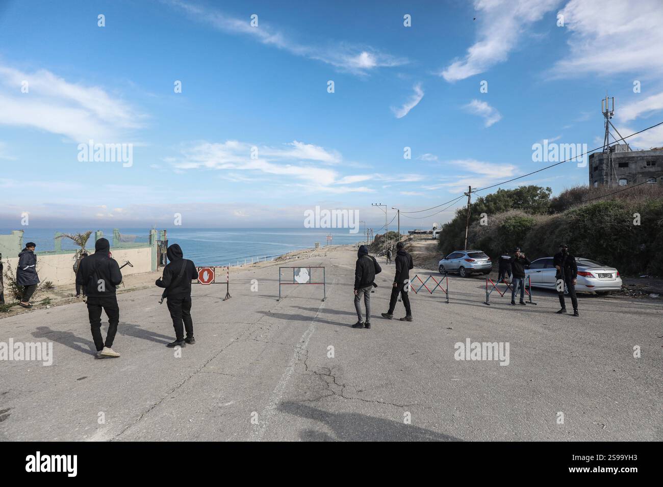 Palestinian police take measures at the check point on Al-Rashid Street ...