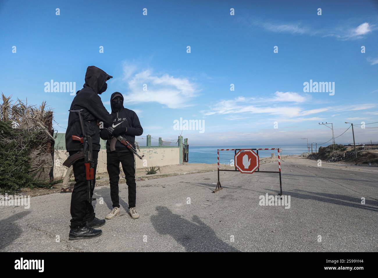 Palestinian police take measures at the check point on Al-Rashid Street ...