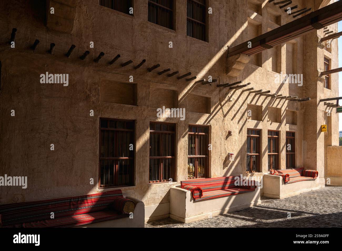 Historic building housing stables with Arabian horses near Falcon Souq ...