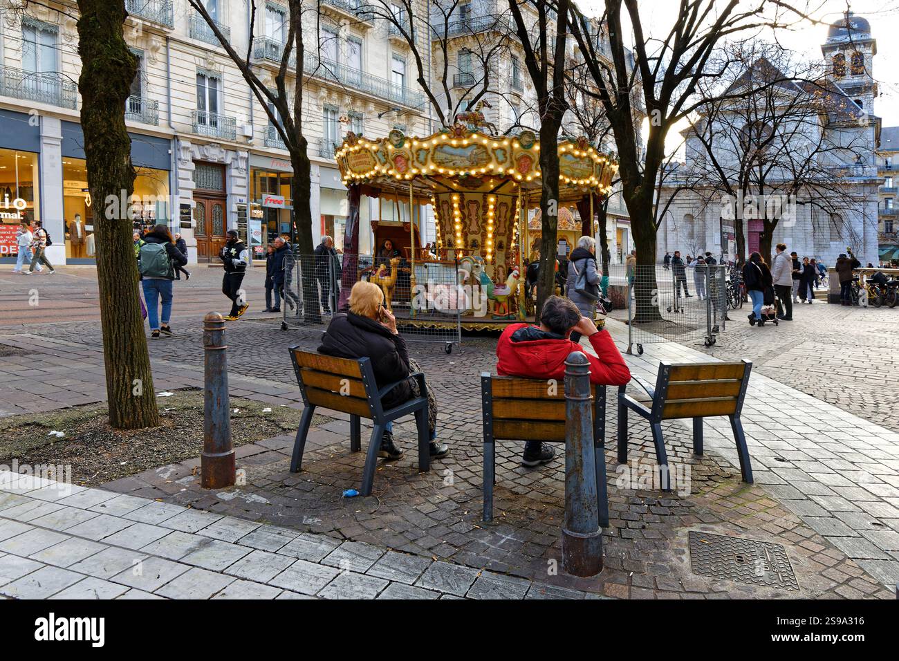 GRENOBLE, FRANCE, January 25, 2025 : Saint-Louis Church, a merry-go ...