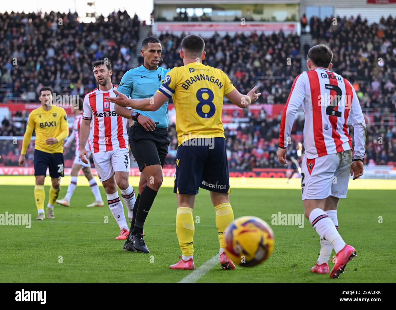 Oxford United's Cameron Brannagan reacts as he receives a yellow card ...