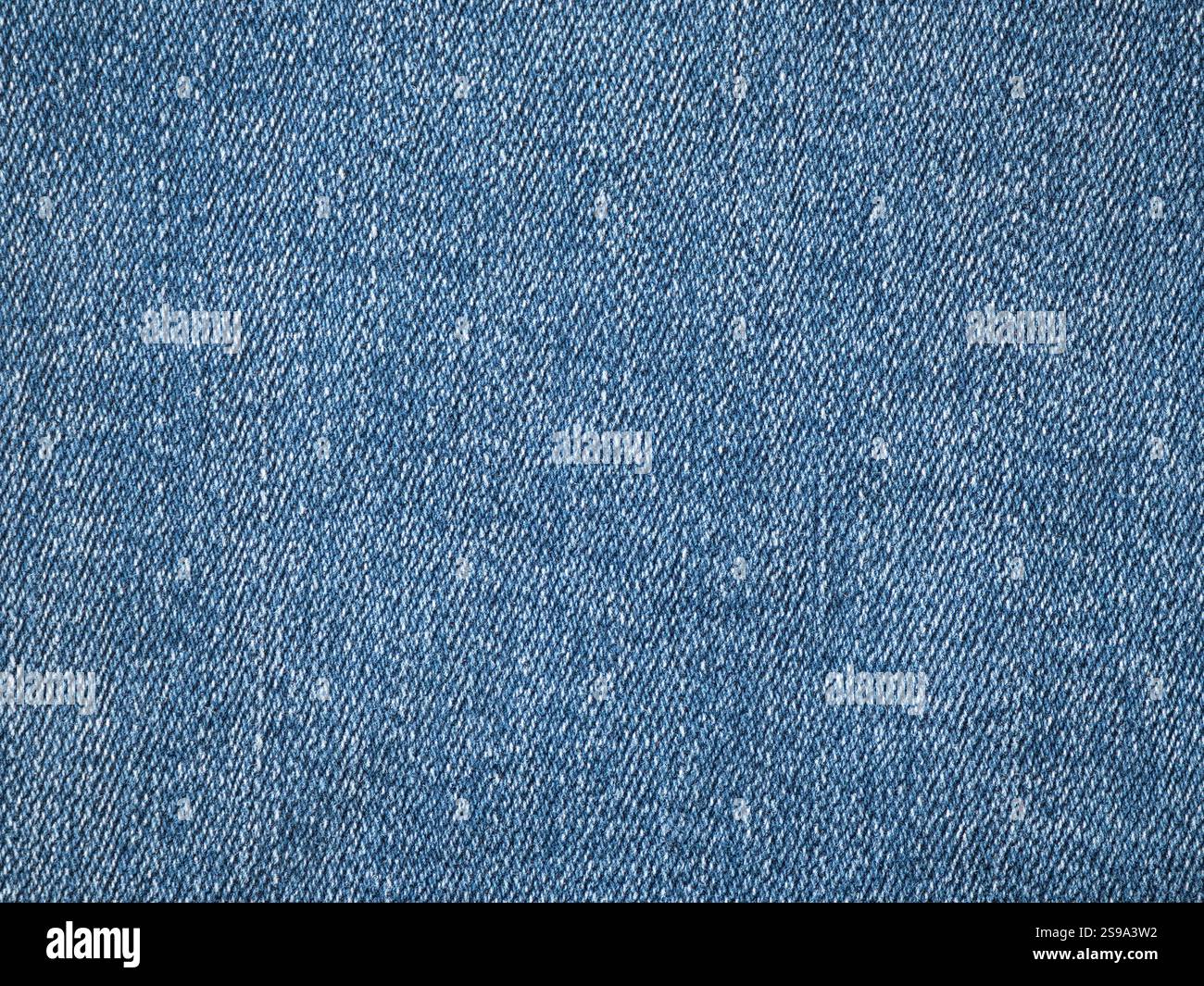 fabric showcases a classic blue denim texture Stock Photo - Alamy