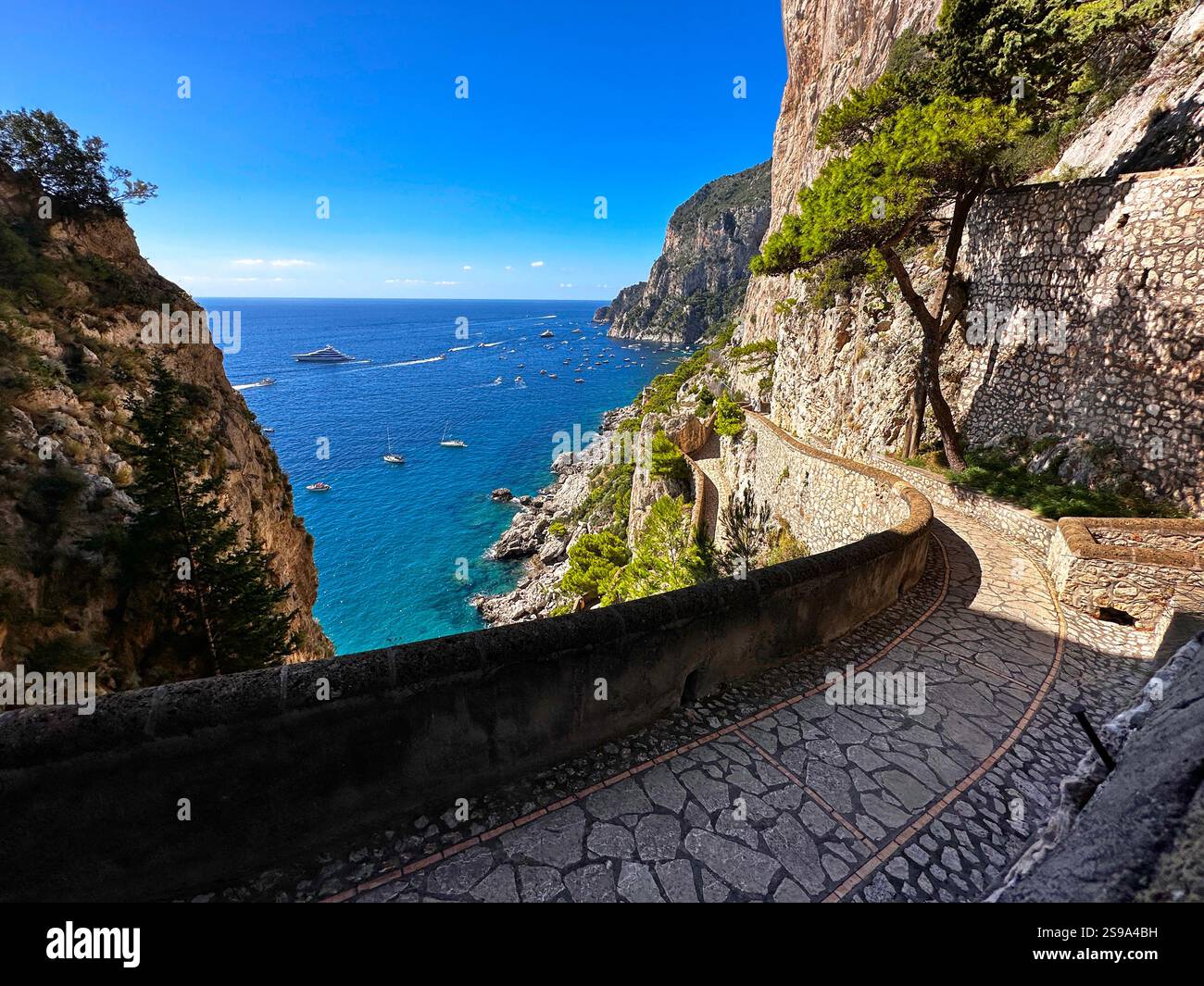 Via Krupp vintage stairs to sea, Capri island, Italy Stock Photo - Alamy