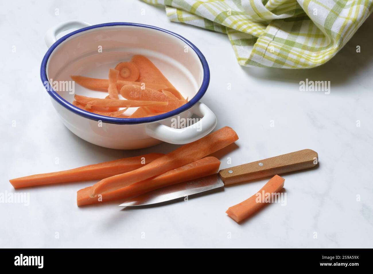 Carrot, carrot sticks with knife Stock Photo - Alamy