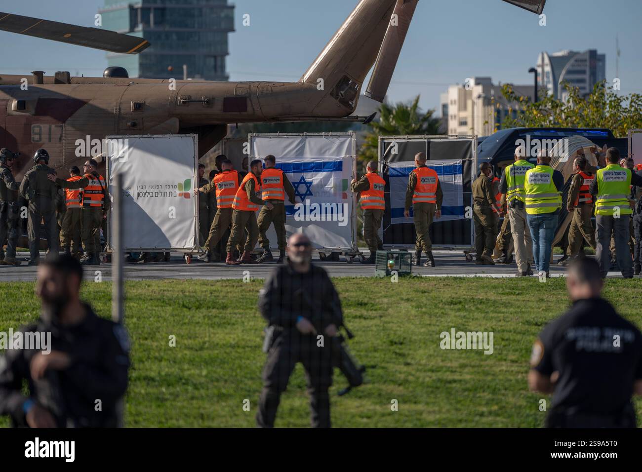 25 January 2025, Israel, Tel Aviv: The four hostages arrive at ...