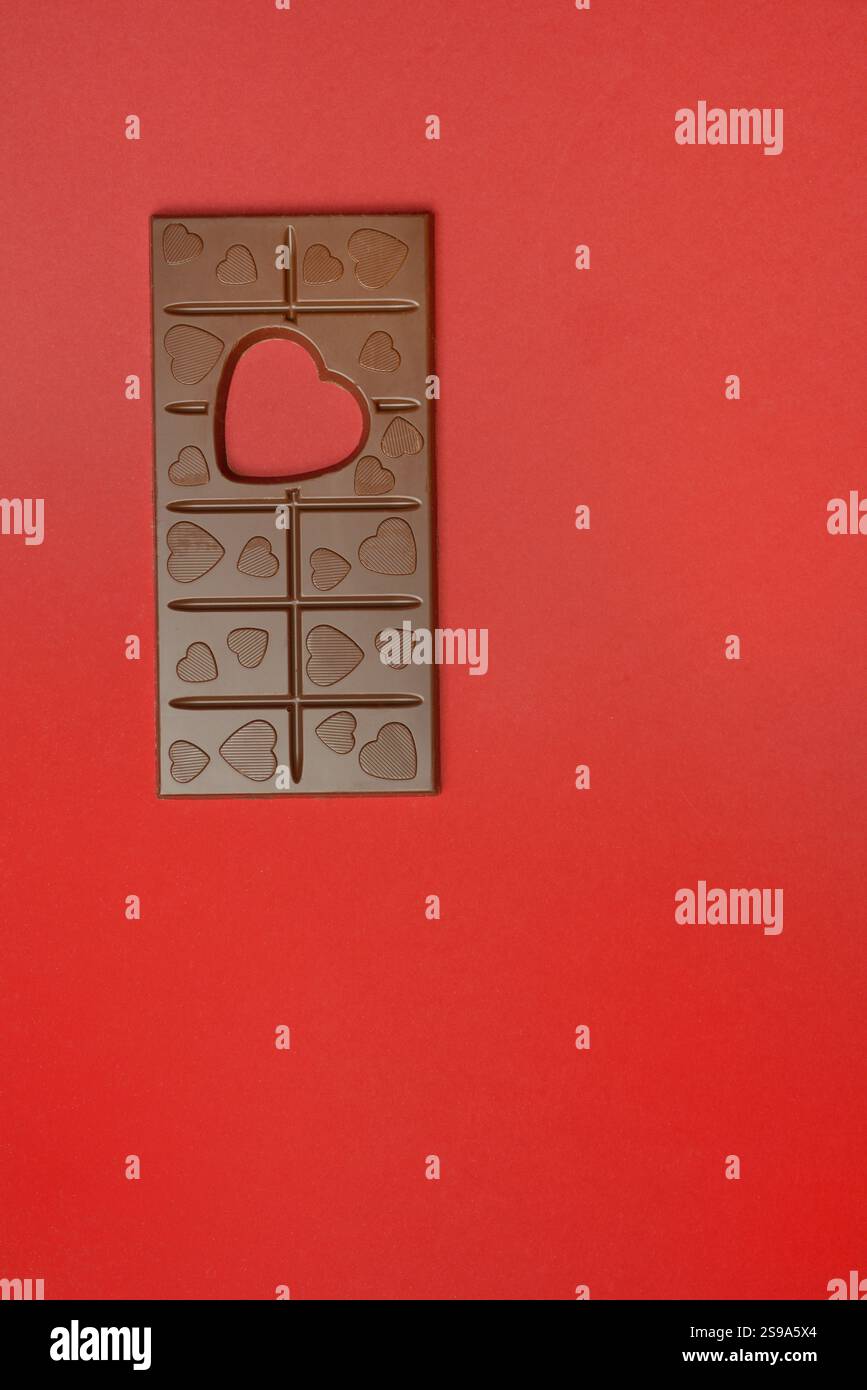 Chocolate bar with heart shape Stock Photo - Alamy