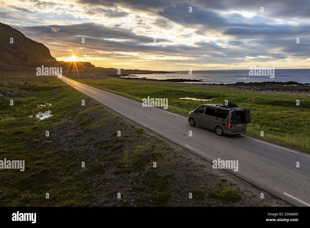 Camper van travelling along the road to Berlevag, VW California ...