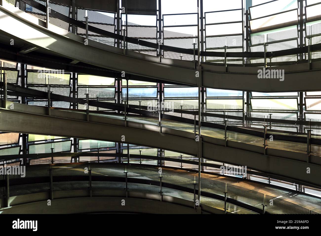 Spiral-shaped entrance and exit ramps for cars in a multi-storey car ...