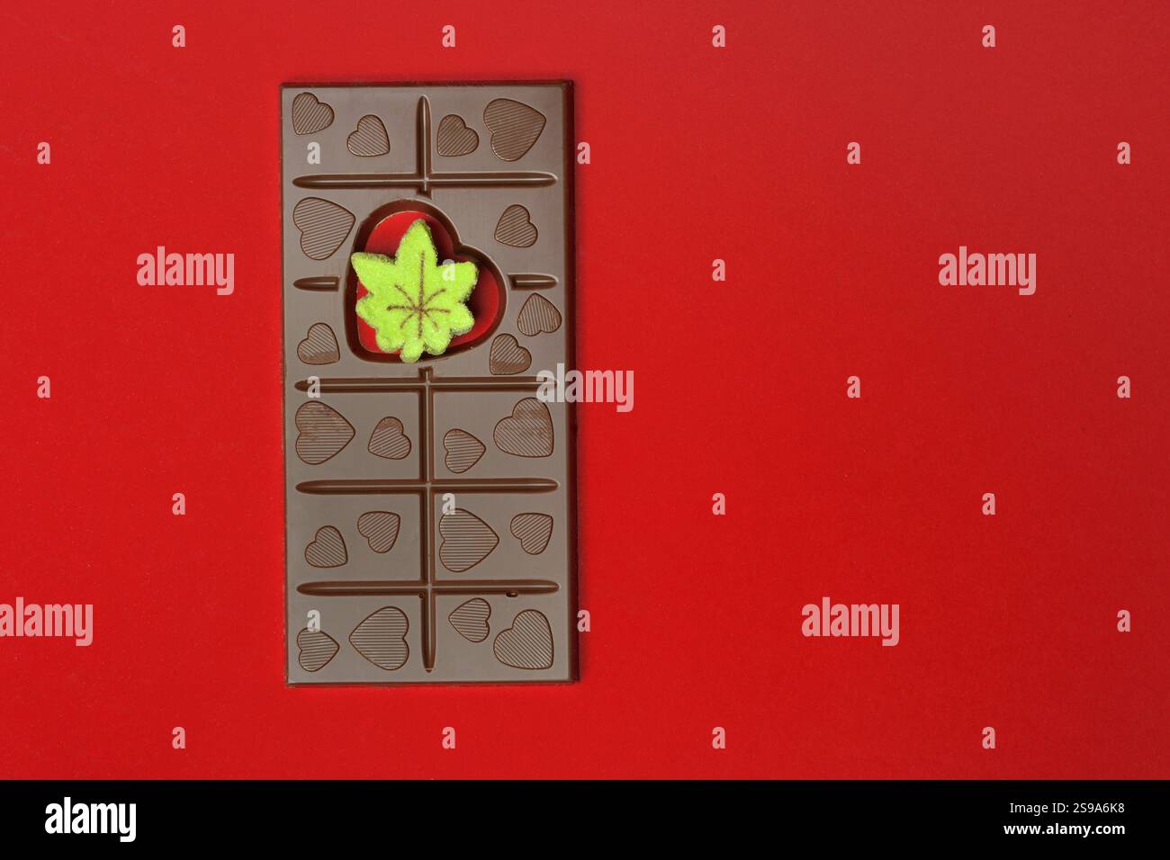 Chocolate bar with heart shape Stock Photo - Alamy